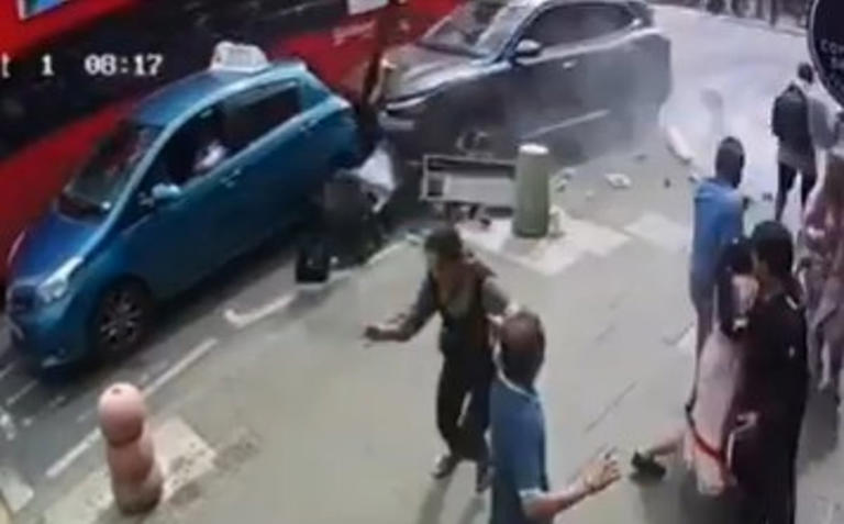 Shocking moment car mounts pavement and ploughs into pedestrians