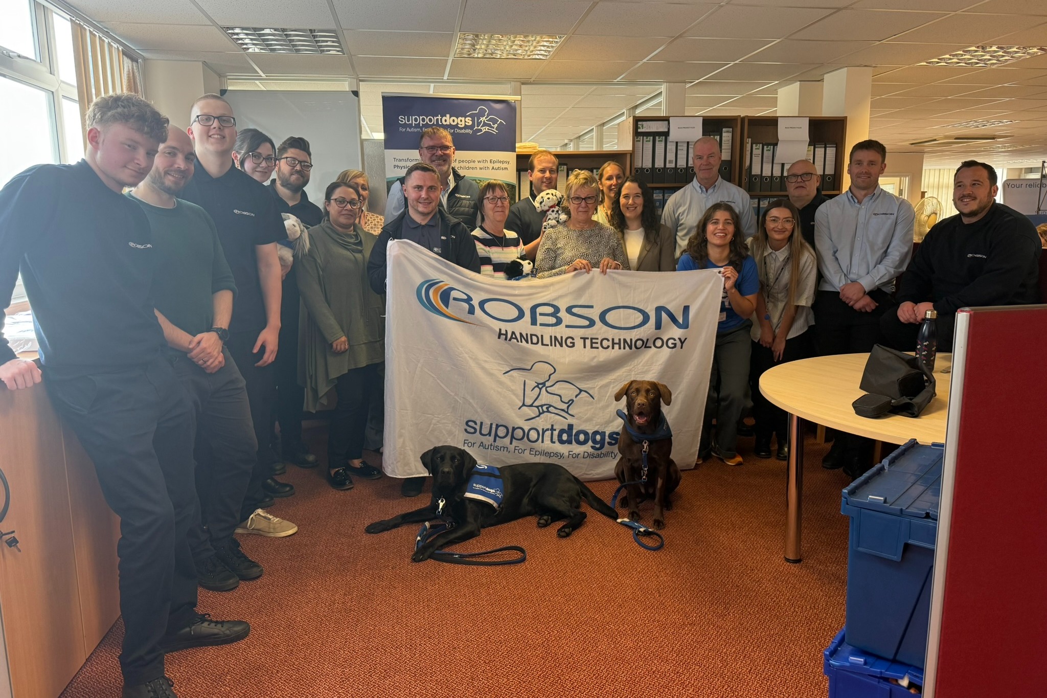 Engineering firm raises thousands for Support Dogs