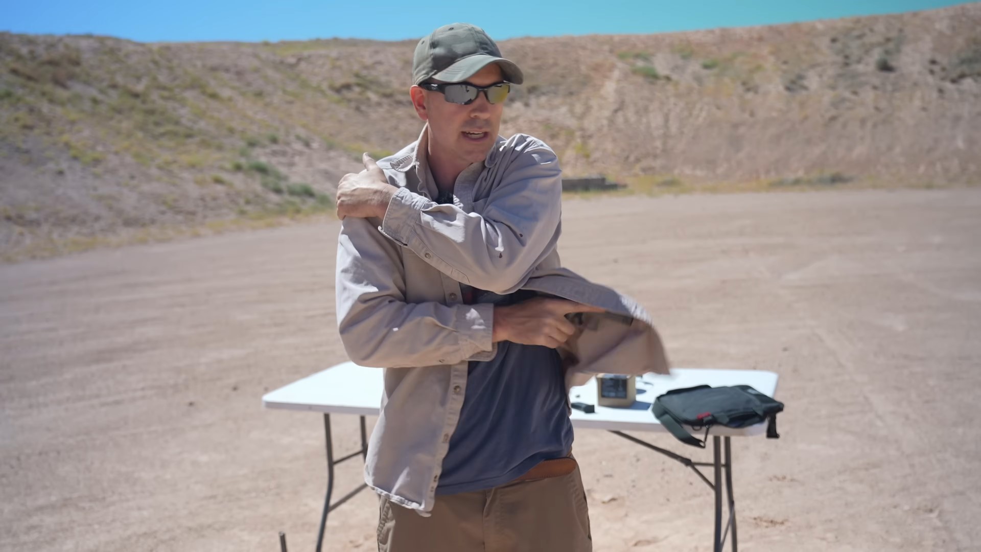 Drawing from concealment in public without tipping off the threat