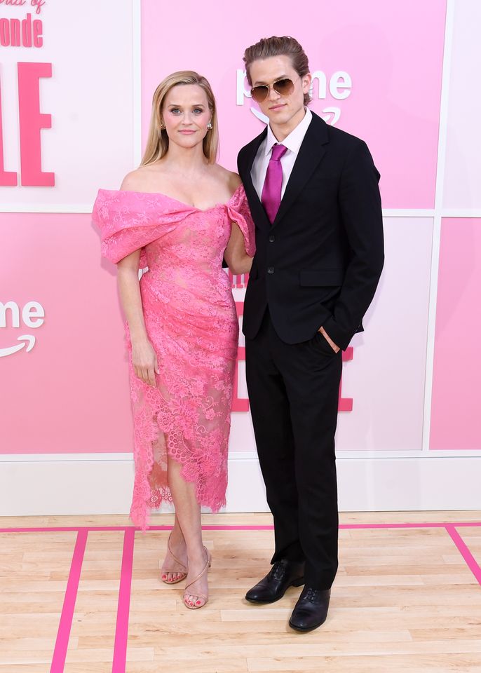 Reese Witherspoon radiates in skin-baring sheer pink lace dress for ...