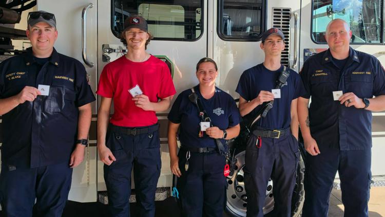 Harvest firefighters receive stork awards after helping deliver baby in ...
