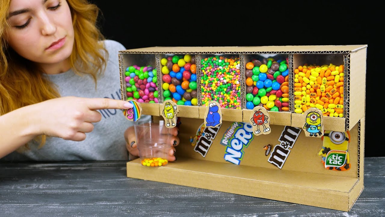 Smart girl shows how to build candy dispenser