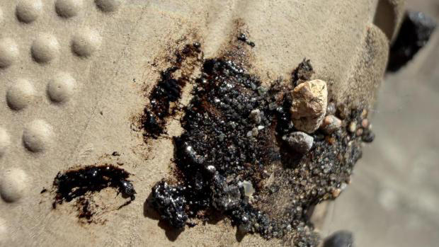Bits of tar sticking to tyres as road in Reading melts in heatwave