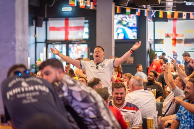 Beer pitchers galore as England and Ghana fans pack out sports bar for ...