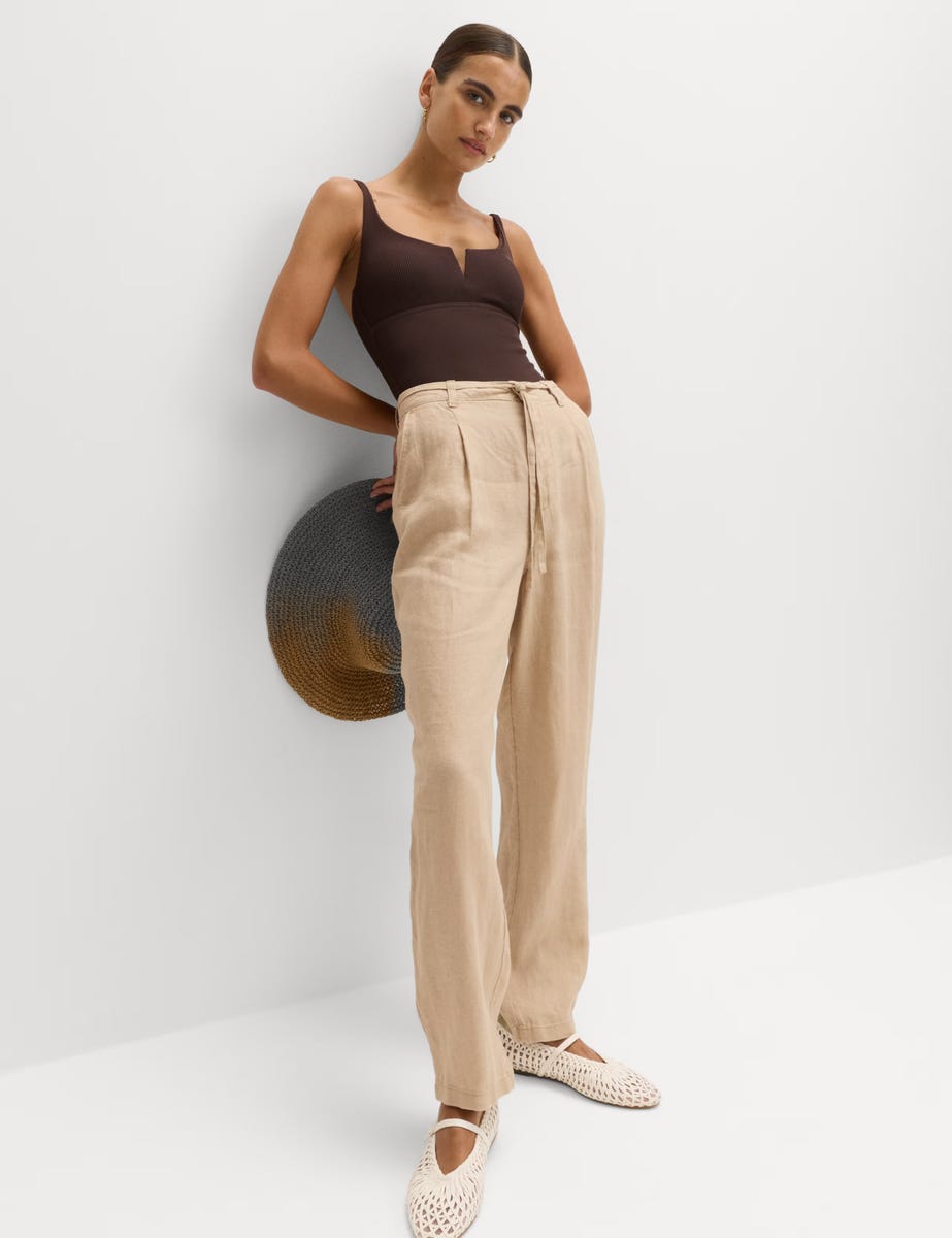 Linen trousers are key to dressing chic for work in the heat, and M&S's ...