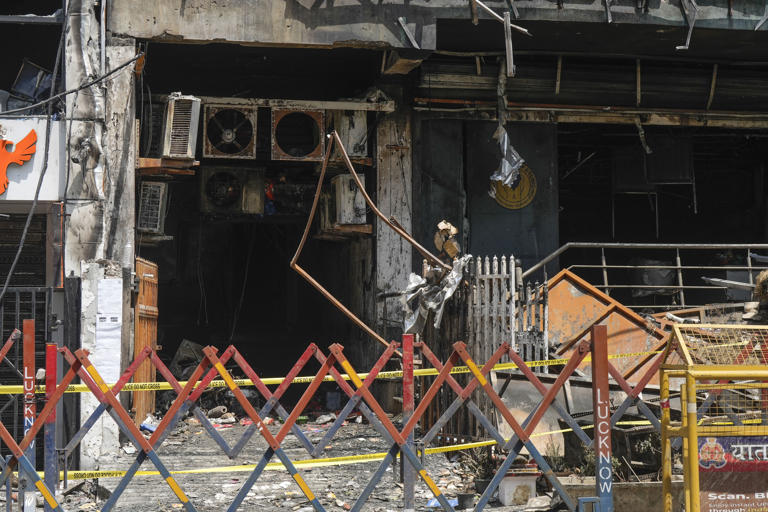 Reminder of loss: Gutted Aliganj building draws mourners, curious onlookers