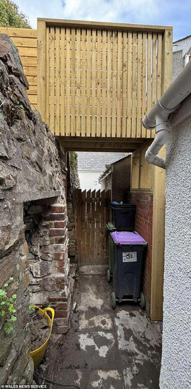 Homeowner ordered to tear down 'overbearing' wooden bridge he built to ...