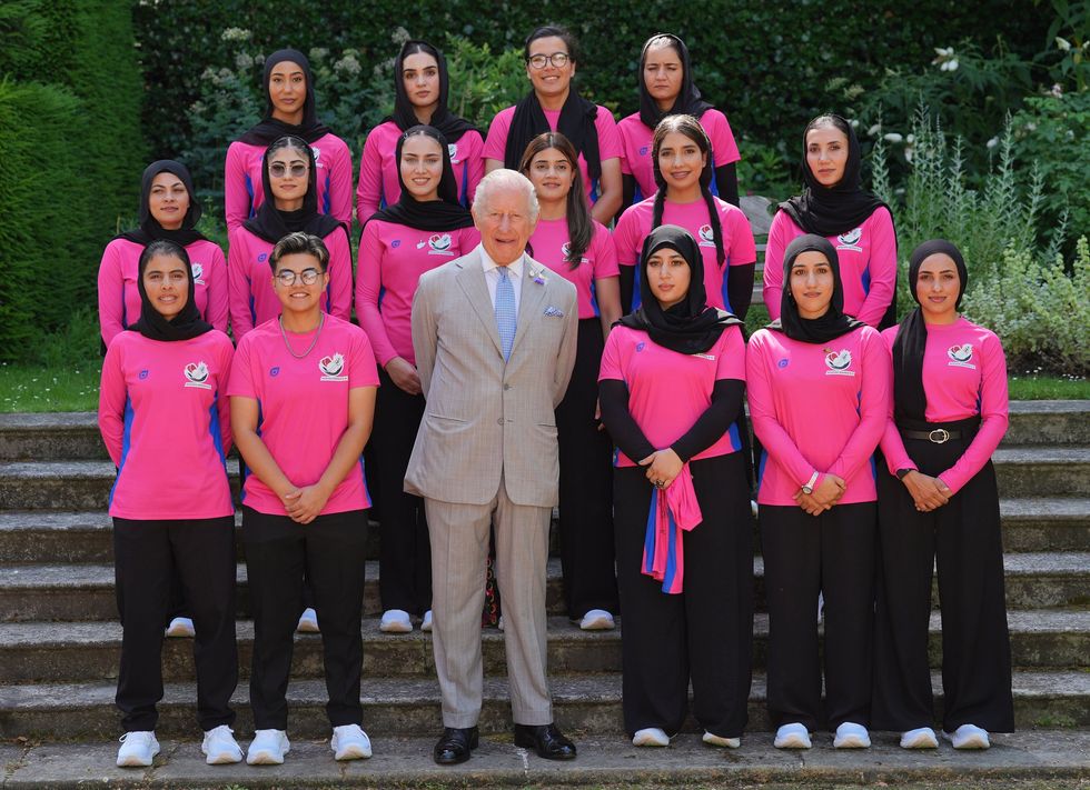 King welcomes Afghan refugee women's cricket team to royal residence as ...