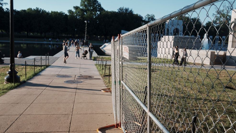Fencing goes up around Reflecting Pool amid vandalism investigation