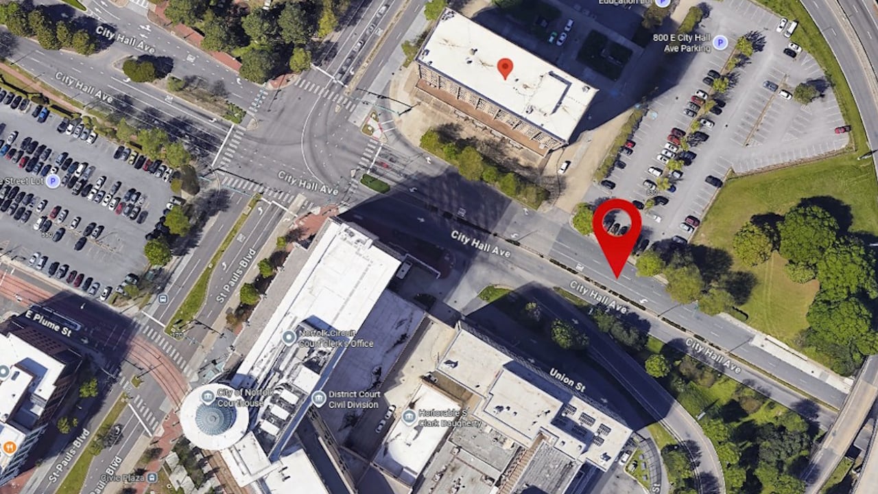 Woman rescued after vehicle plunges into sinkhole