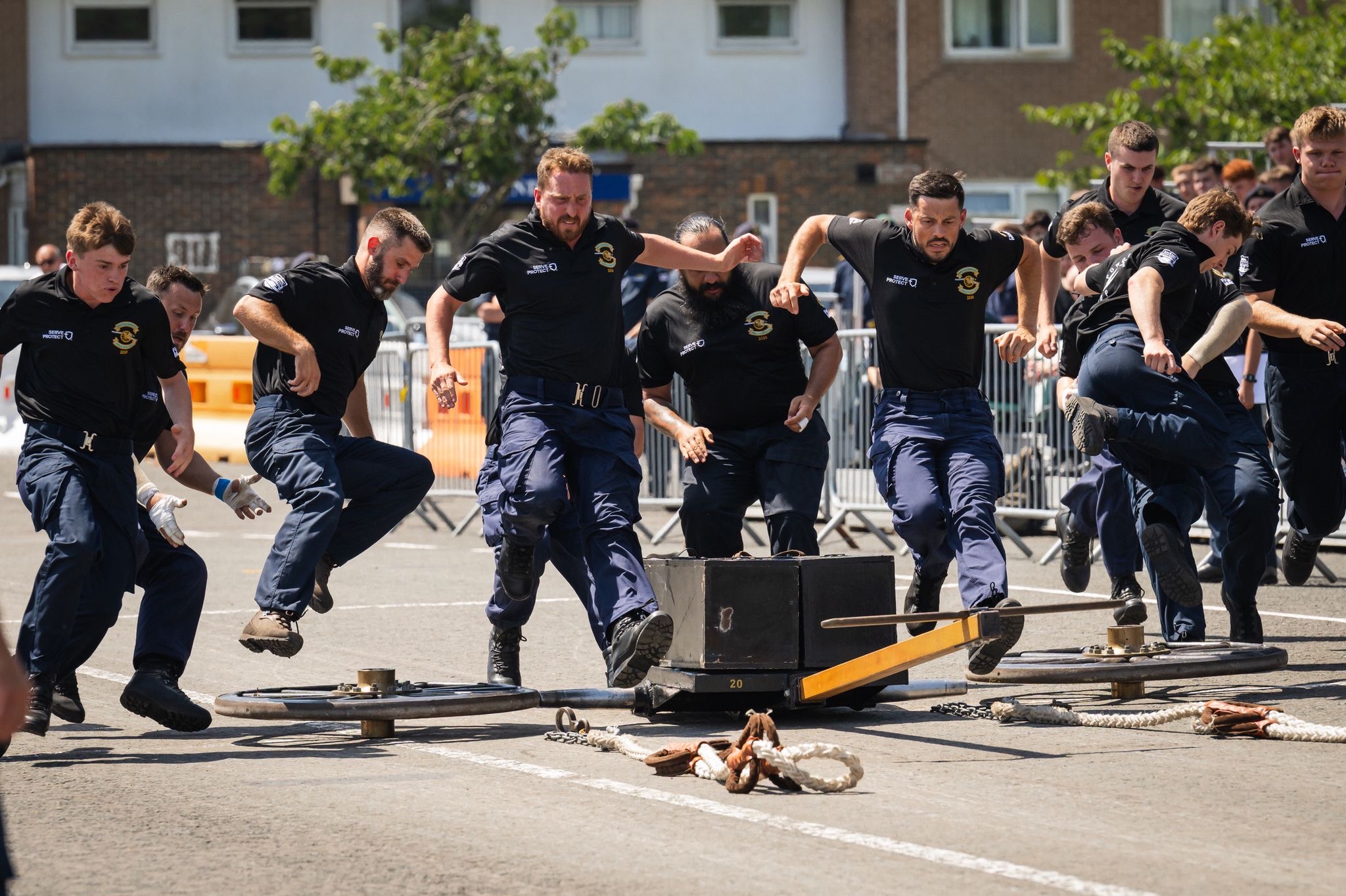 Scorching 35C weather doesn't stop Royal Navy sailors pushing large ...