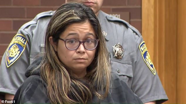 Woman arrested for baby's murder 10 years after body found in dumpster