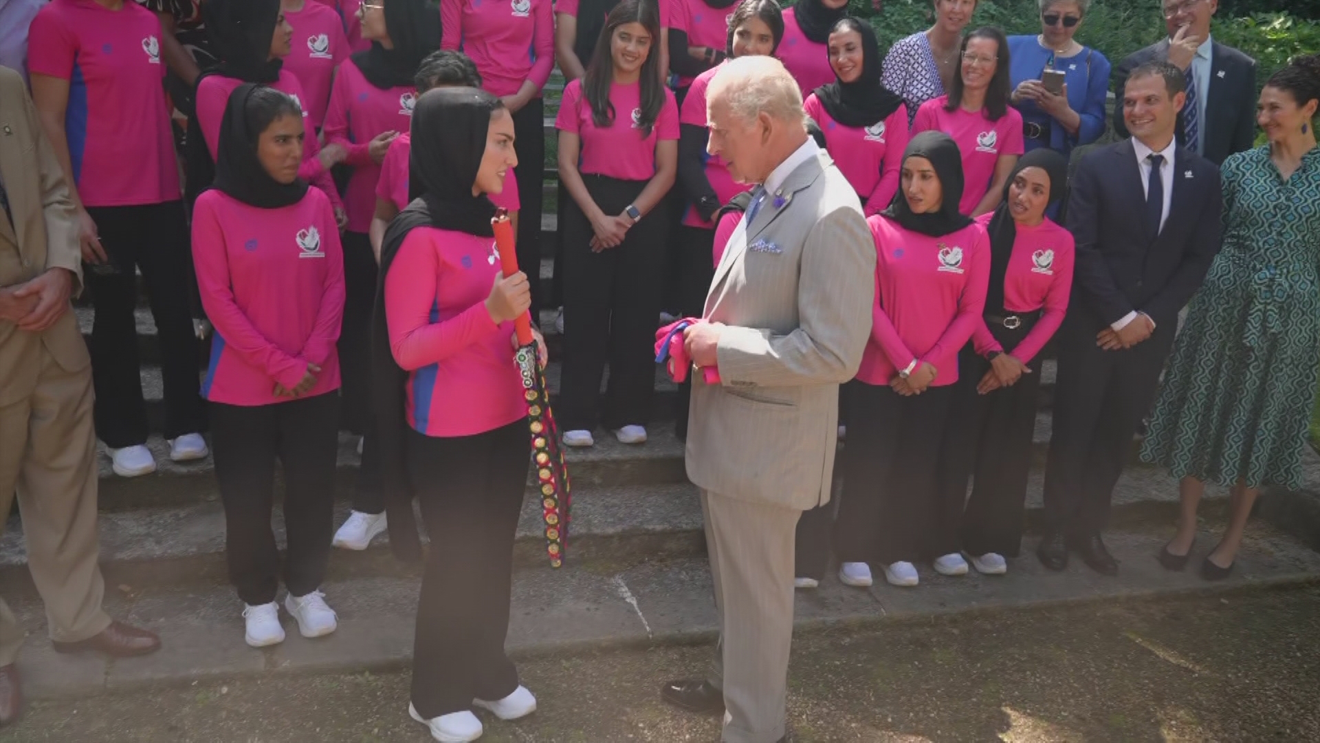 King Charles meets Afghan refugee women's cricket team
