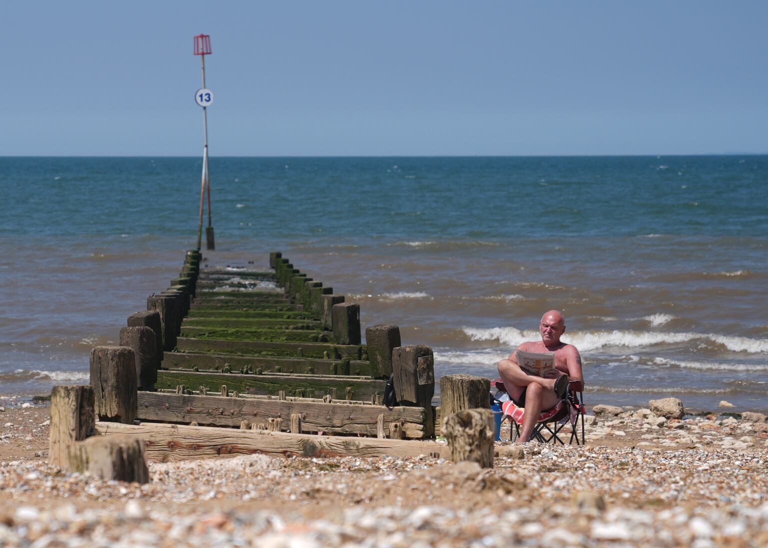 June temperature record broken as UK swelters in exceptional heat