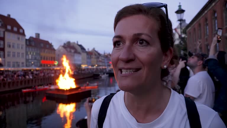 Midsummer bonfire lights up Copenhagen canal