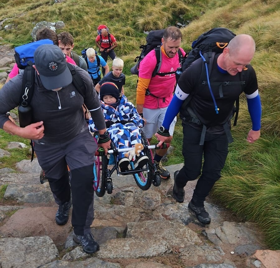 Fundraiser to scale Three Peaks whilst carrying his paraplegic son in ...