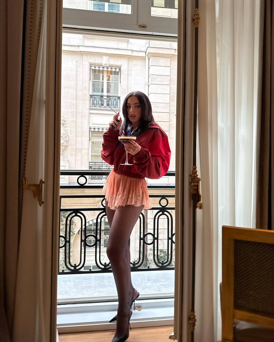 Hollywood actress looks disgusted by Charli XCX smoking at fashion week