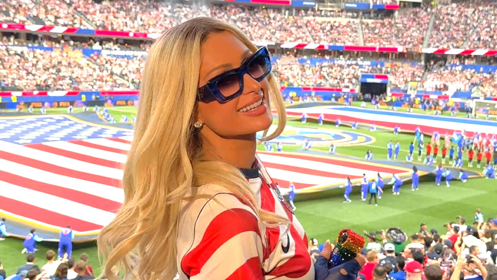 Paris Hilton sports a very American look in the World Cup stands