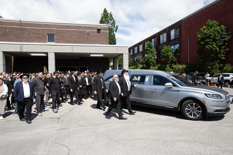 'Hero' Michel Mizrahi likely saved lives during shootout, mourners hear