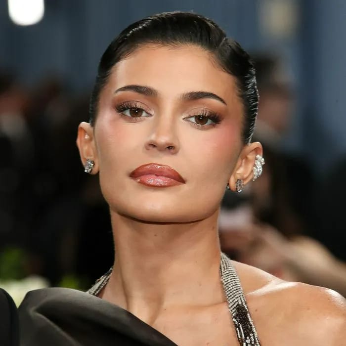 Kylie Jenner wears a rosette dress for Meta glasses launch party