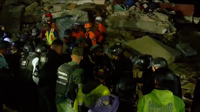 Rescuers work to free people trapped under rubber after deadly ...