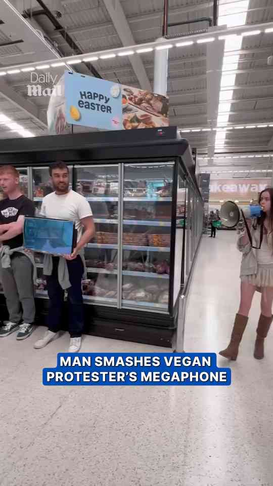Shopper damages activist's megaphone during supermarket confrontation