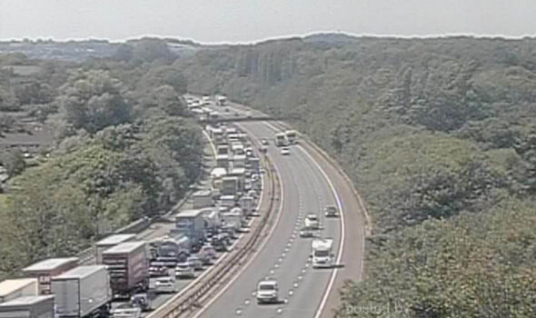 M56 traffic: Chaos on motorway as vehicle fire shuts down lanes ...