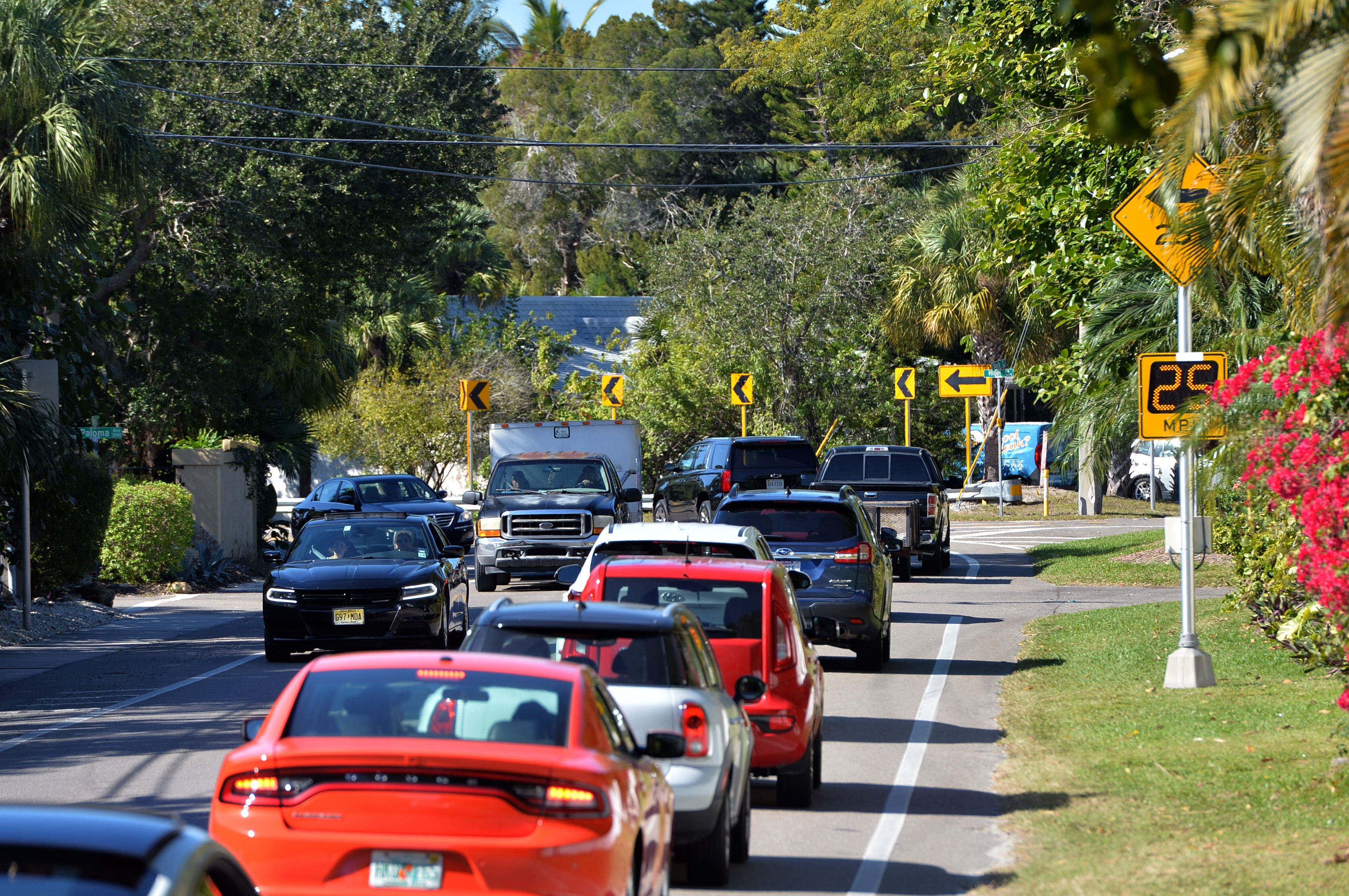 Is it legal in Sarasota to use a parking lot to avoid traffic lights?