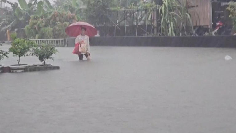 Torrential rain from passing typhoon shuts down southern Taiwan, rail ...