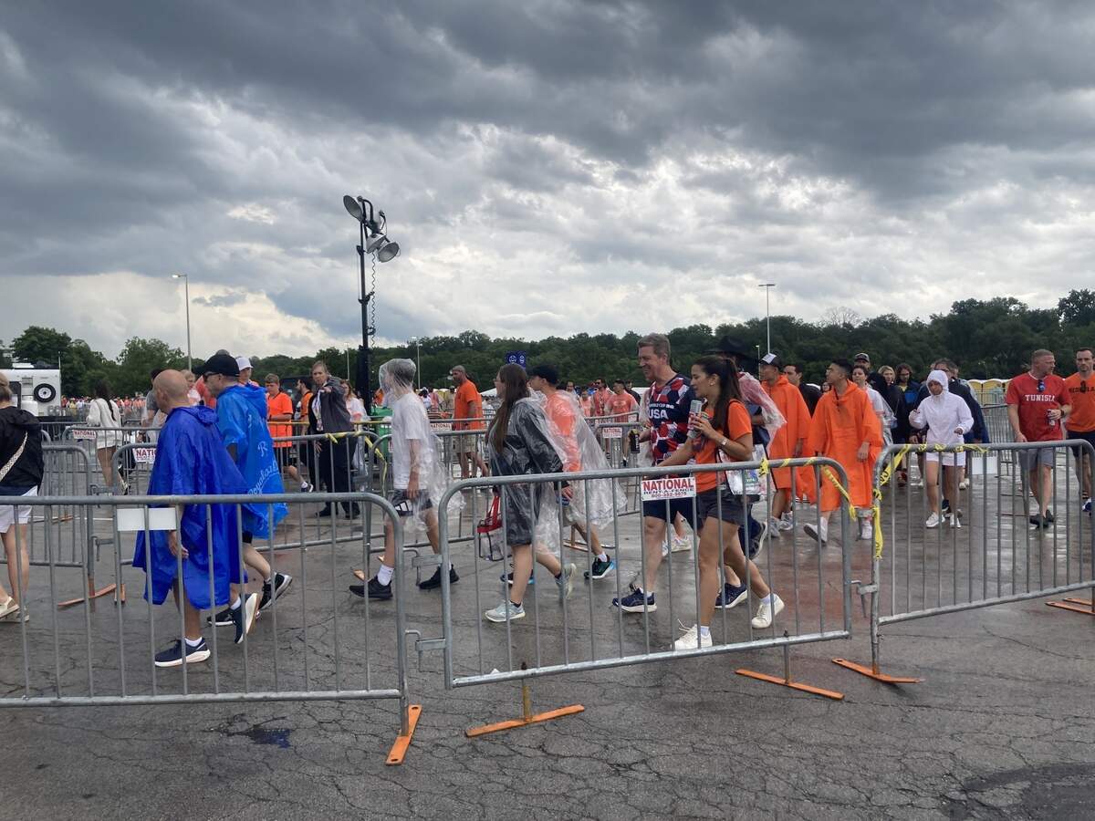 Fans arriving for World Cup in rain told they can't leave buses, can't ...