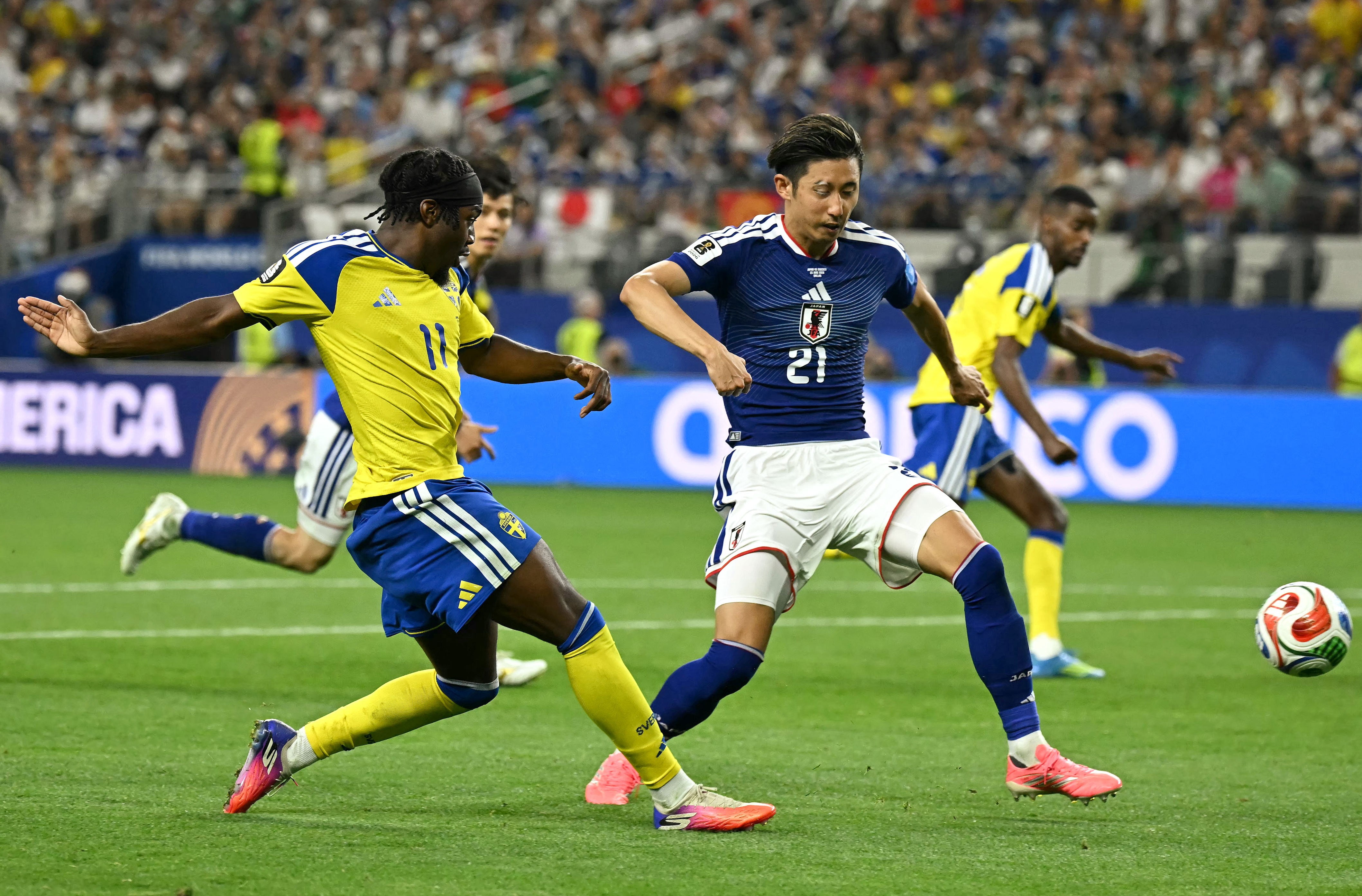 Japan draw 1-1 with Sweden at World Cup to finish second in Group F