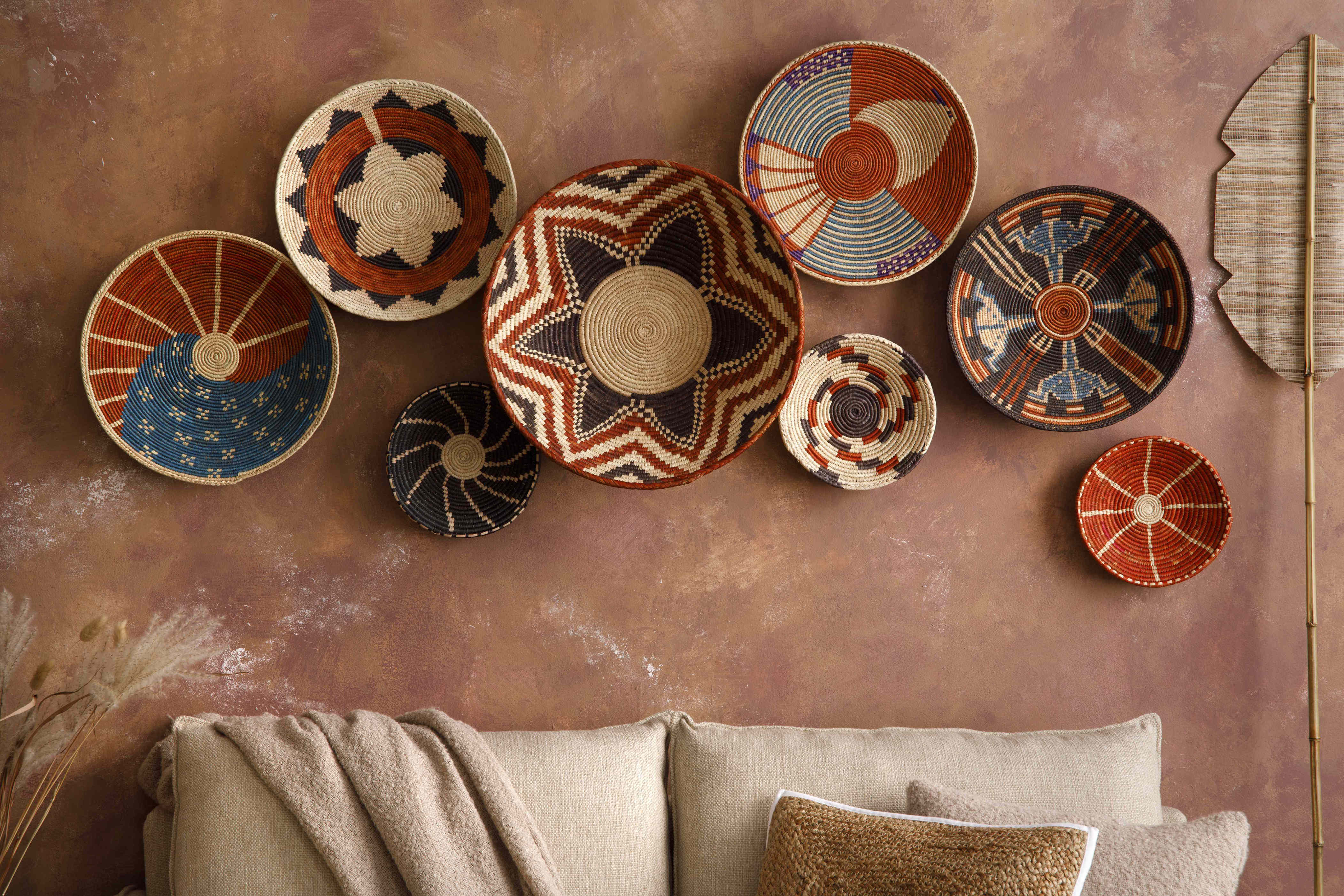 This new wall decor trend is replacing plate walls—and designers say it ...