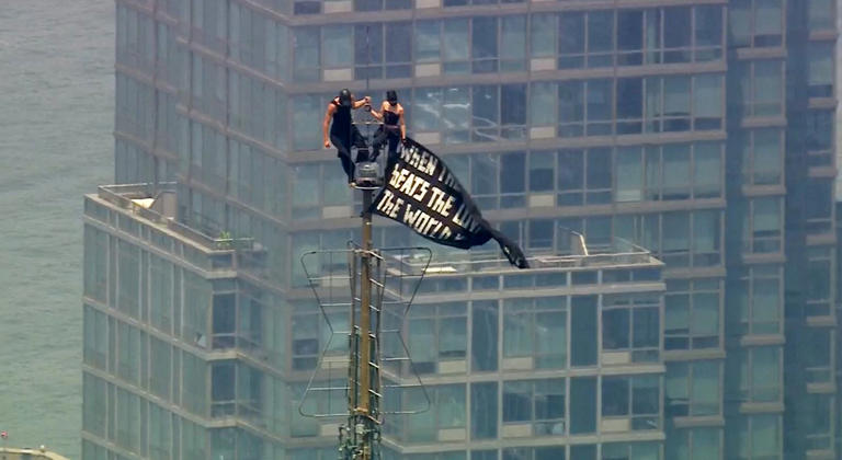 Climber couple arrested after scaling Empire State Building antenna for ...