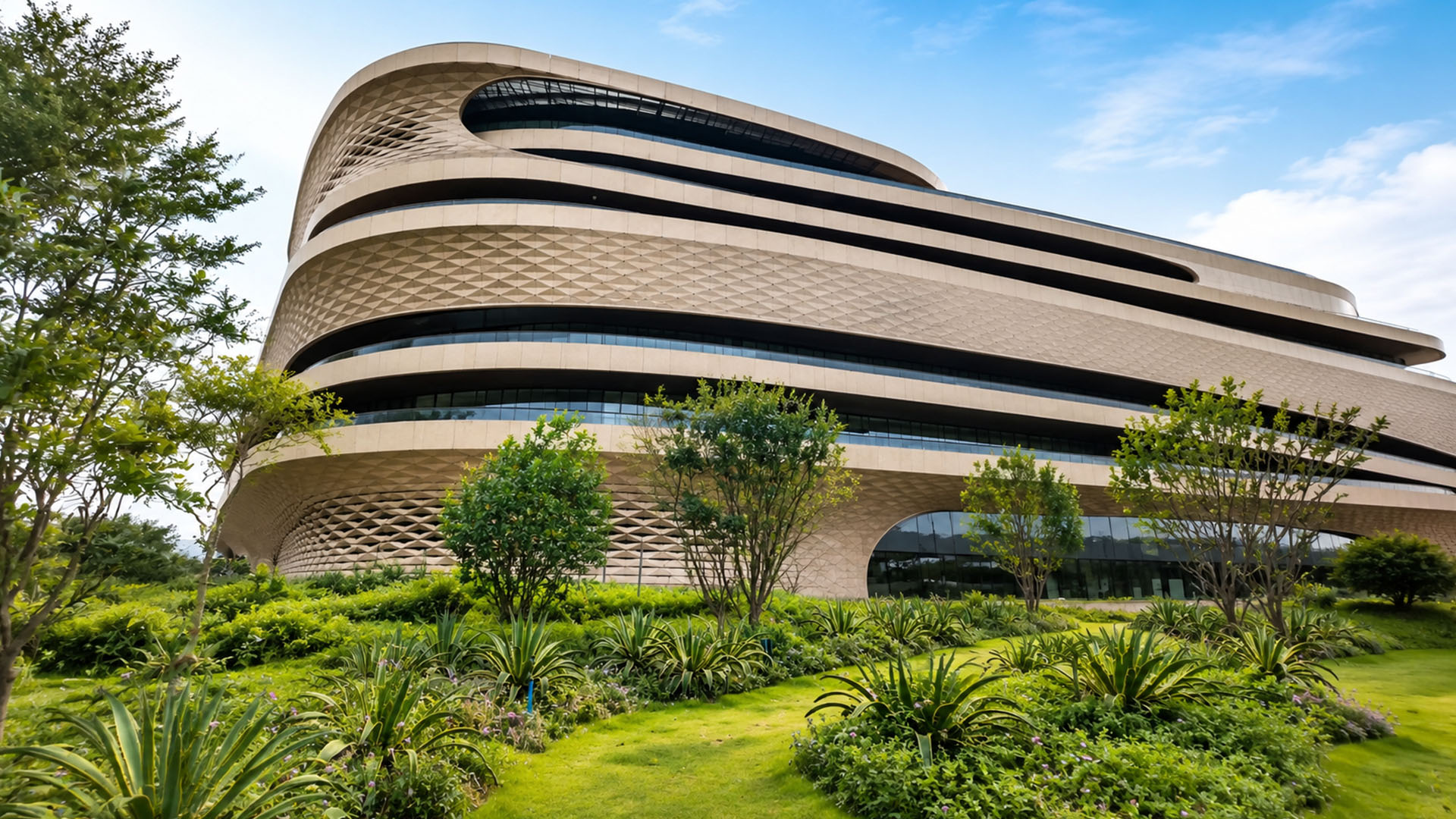 A wave shaped shopping center turns green space into a landmark