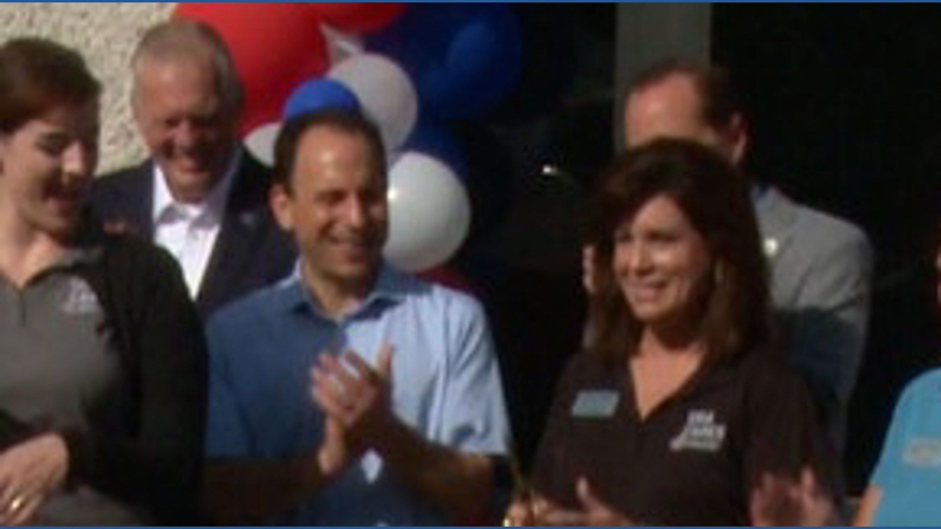 USA Cares call center ribbon-cutting