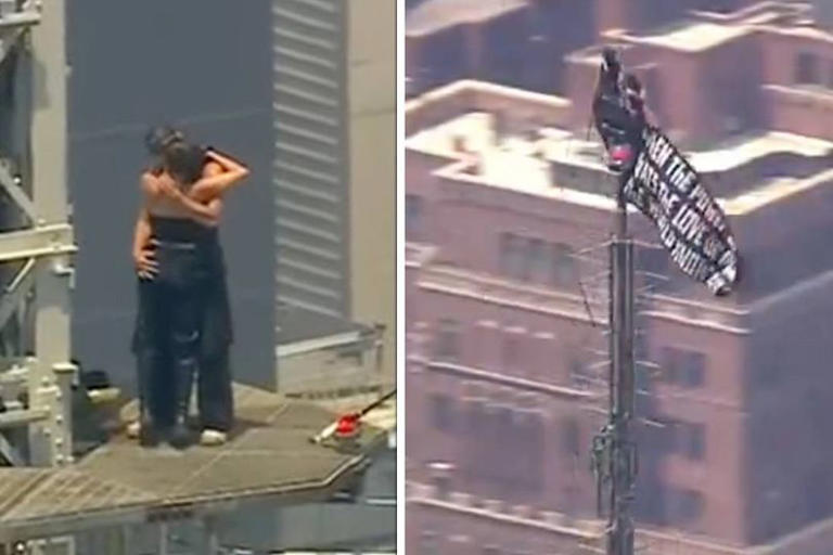 Two arrested after climbing Empire State Building in 'marriage proposal'