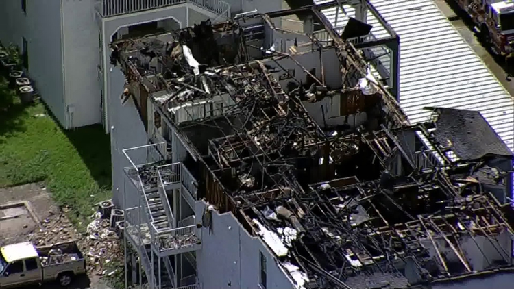 Mesquite apartment complex fire burns through roof, crews actively ...