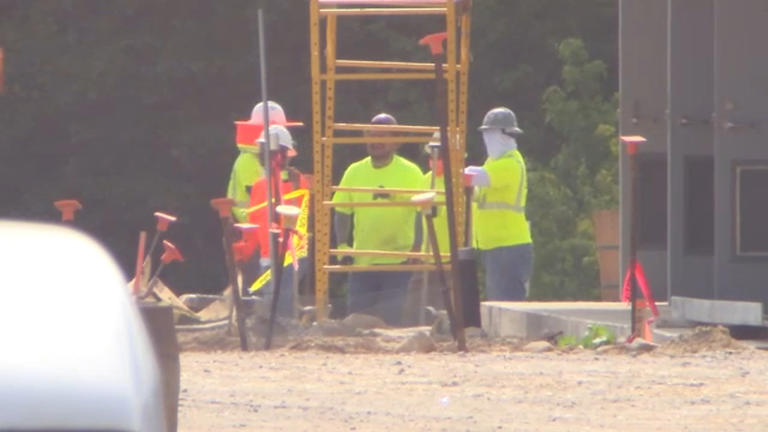 Working through the heat: Construction crews take precautions as ...
