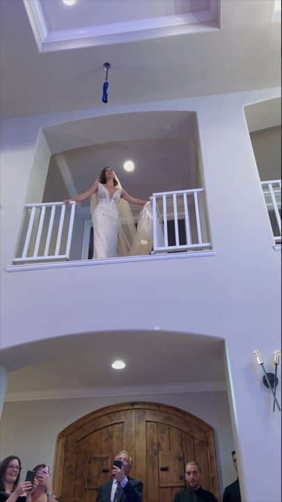 Bride jumps from balcony at wedding!