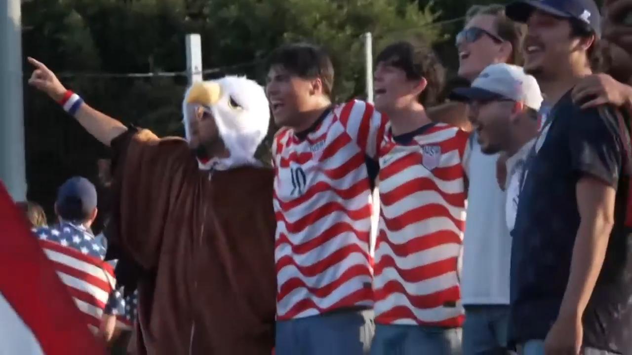 Fans celebrate after the US national soccer team secures a victory over ...