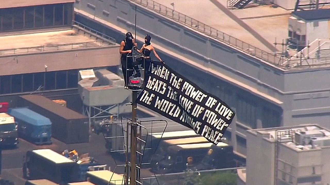 Russian daredevil couple arrested after climbing Empire State Building ...
