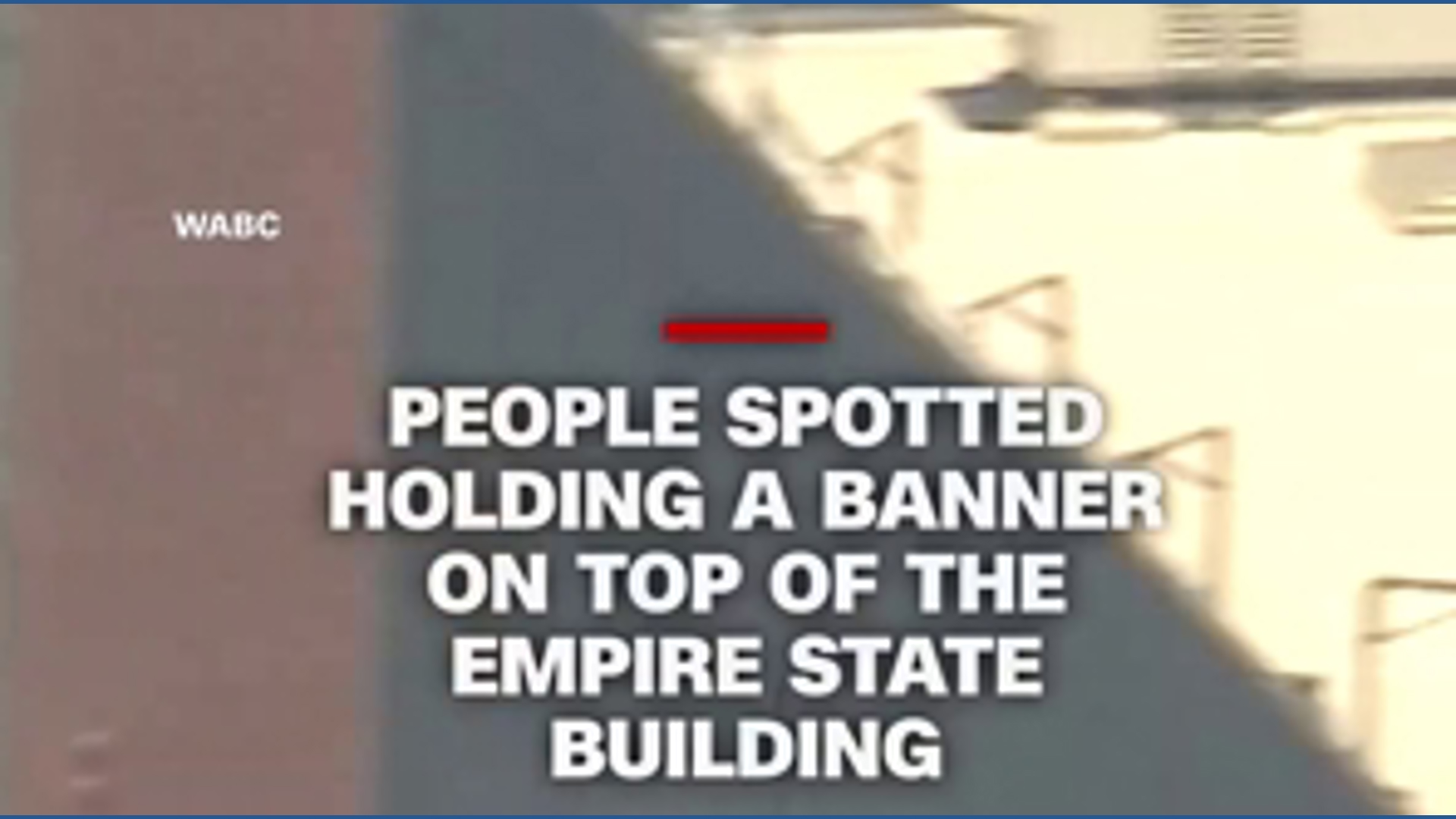 People standing on Empire State Building