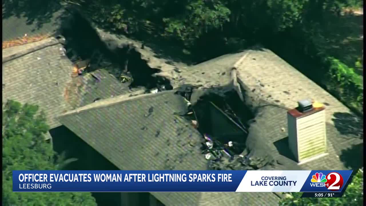 Officer evacuates woman after lightning sparks fire in Leesburg