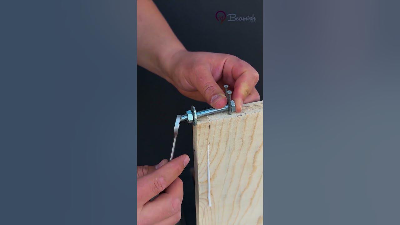 Wood crack repair using a bolt & nut #diy #wood #fixing #bolt #trick