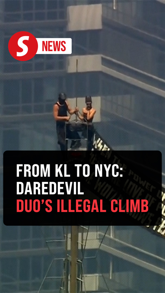Russian daredevils scale Empire State Building