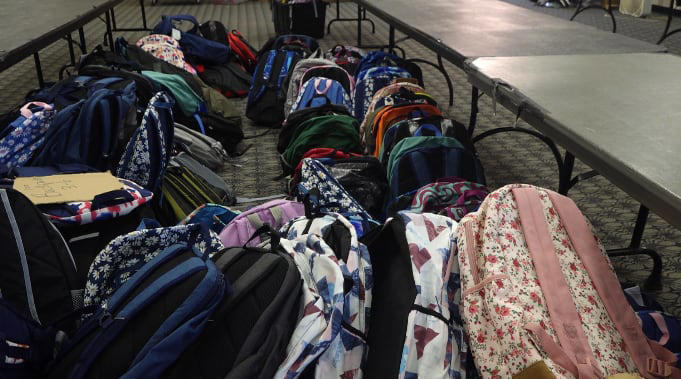 Behind the badge: Las Vegas nonprofit aims to break backpack giveaway ...