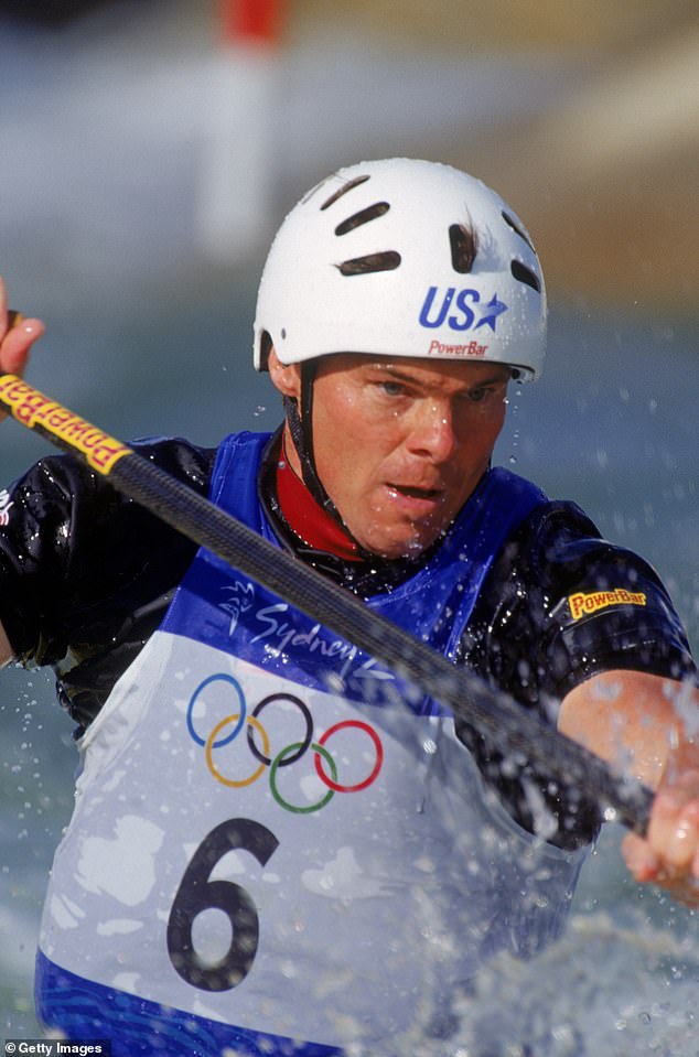 Former Olympian indicted by grand jury after reaching into reflecting pool