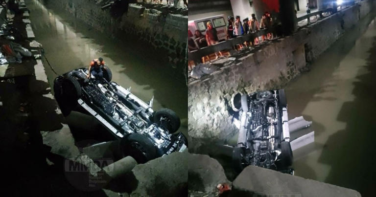 Alleged drunk driver rescued after SUV falls into creek in QC