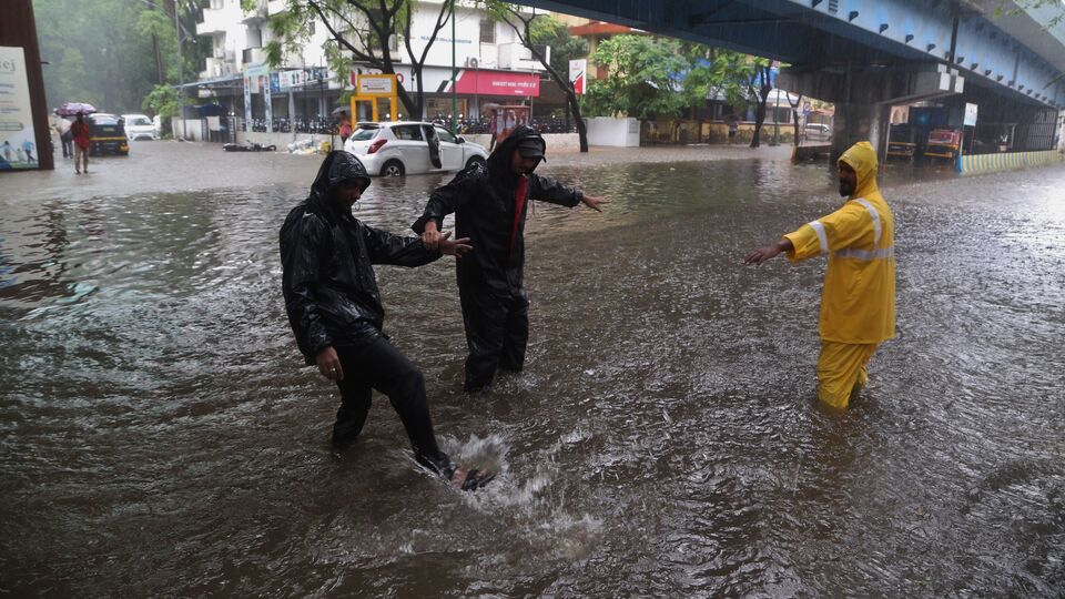 Mumbai rains live: Roads closed, trains cancelled, rescheduled as rain ...