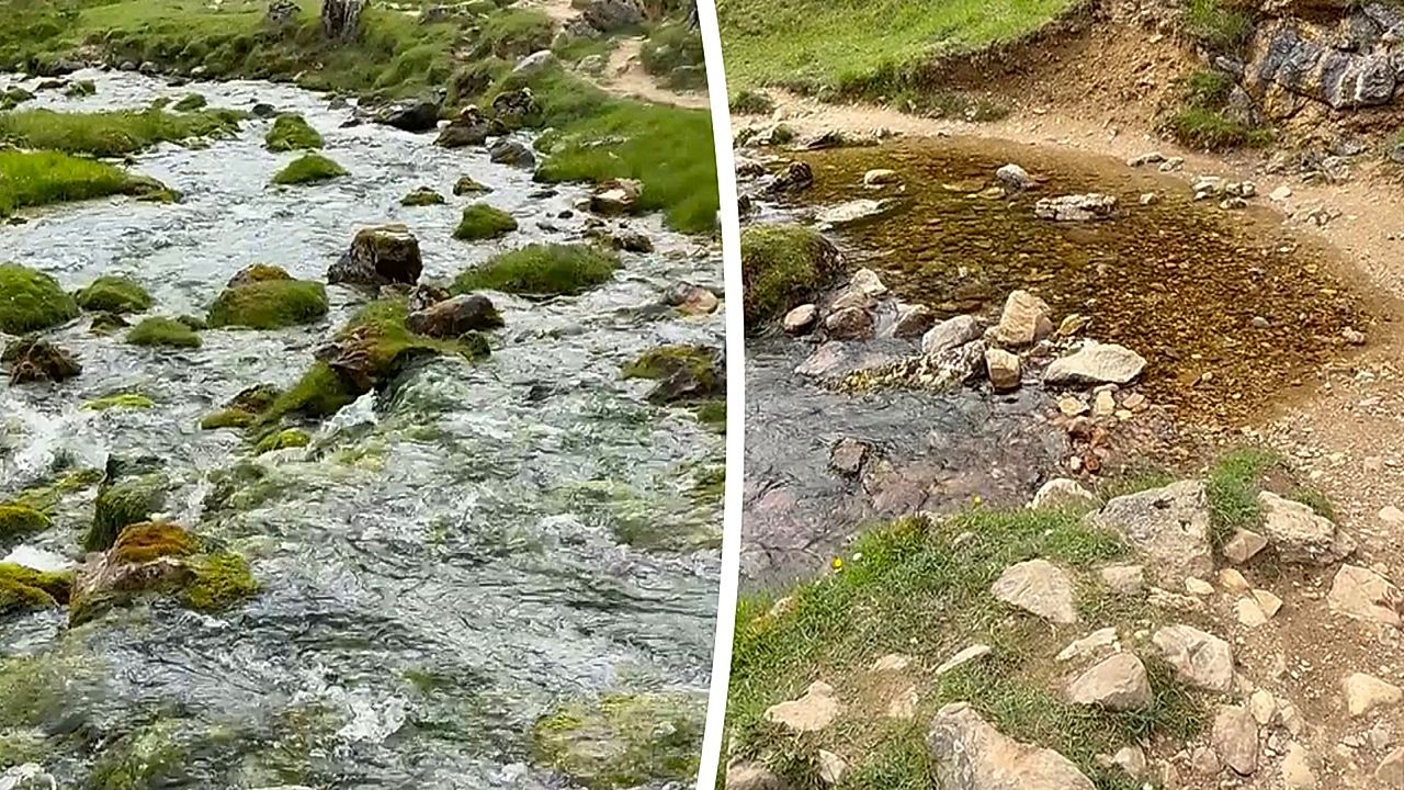 Scottish stream flows from a perfectly still pool of water